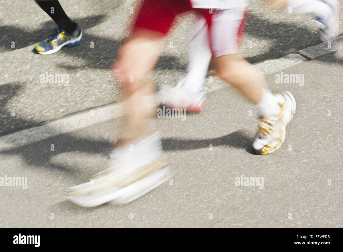 runners in motion Stock Photo - Alamy