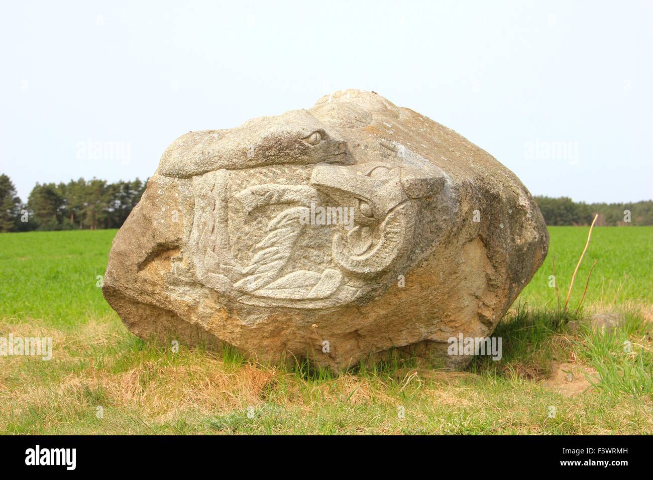 erratic block in park Stock Photo - Alamy