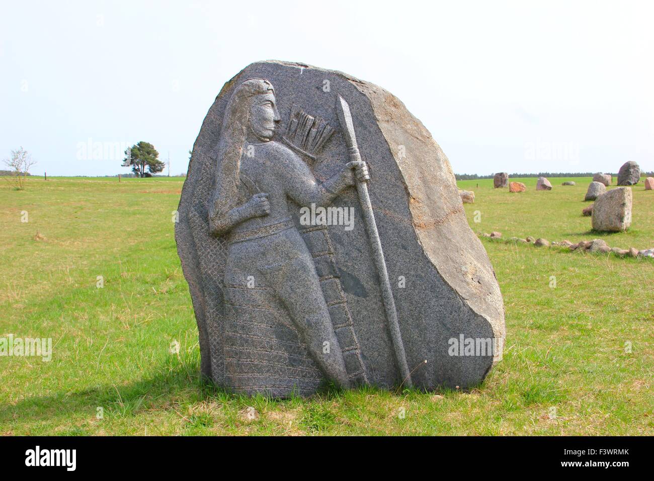 erratic block in park Stock Photo - Alamy
