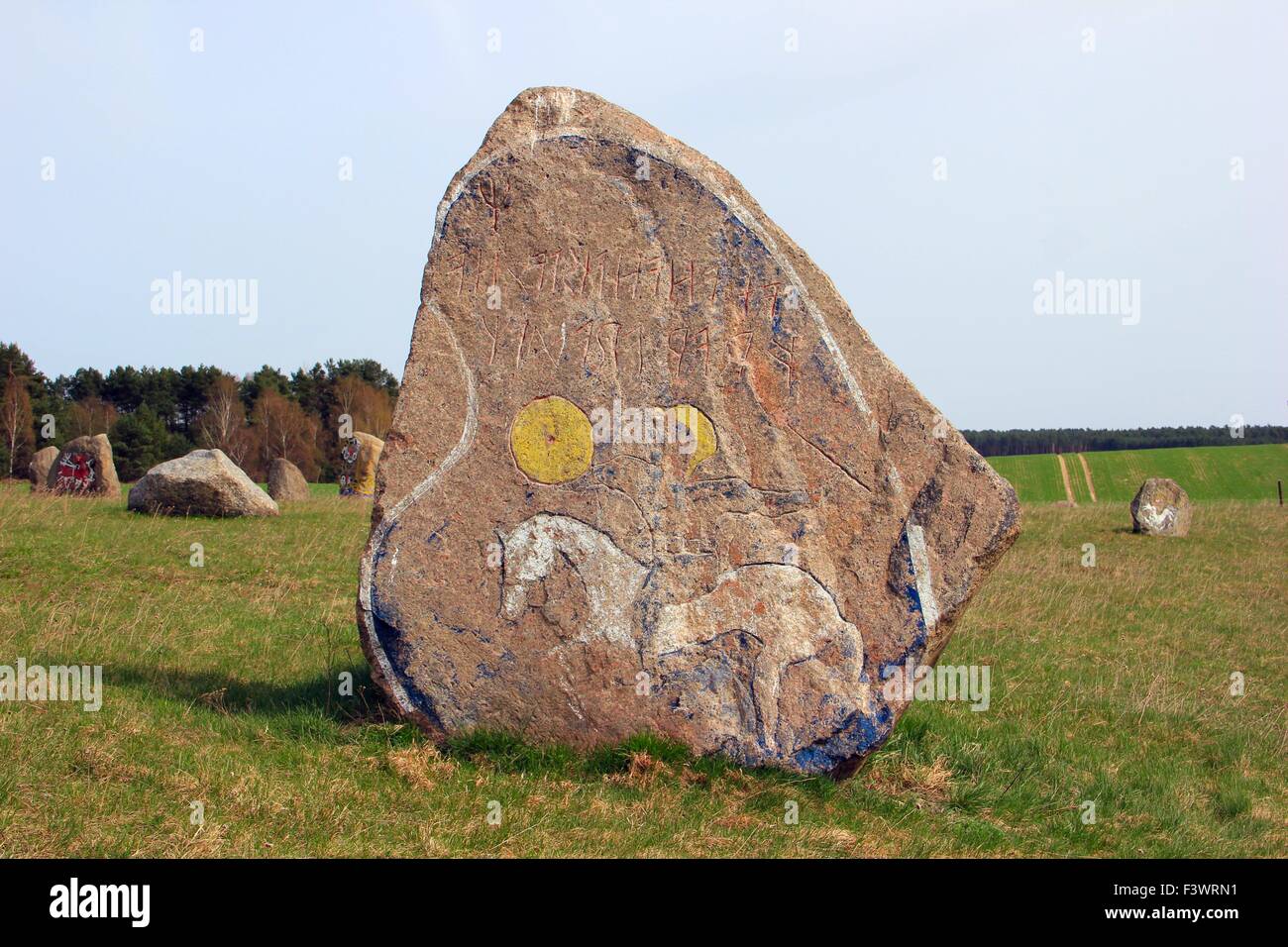 erratic block in park Stock Photo - Alamy
