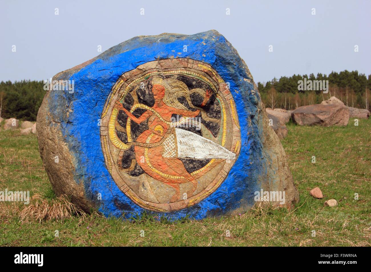 erratic block in park Stock Photo - Alamy