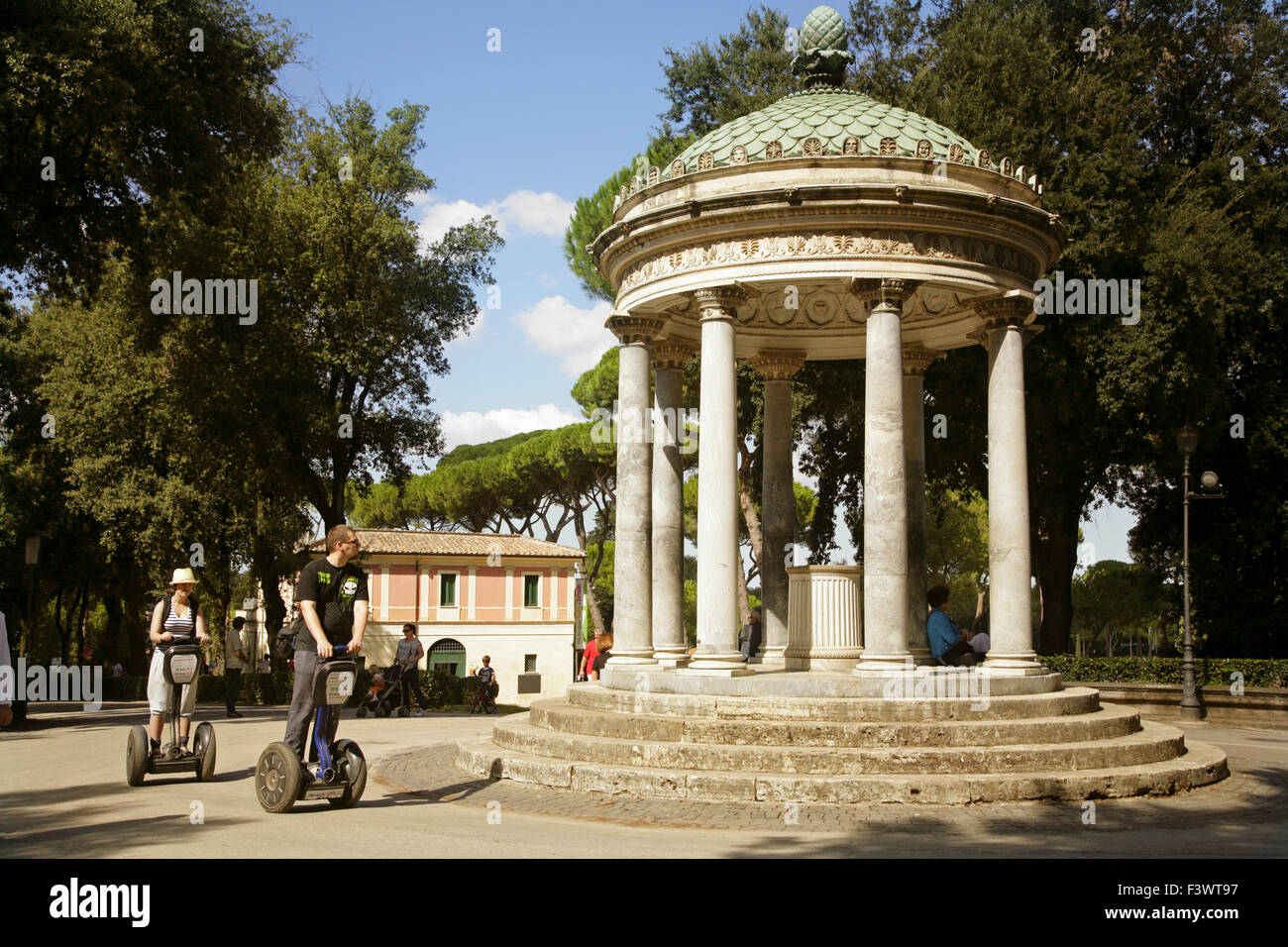 Tourists on Segways at the Temple of Diana (1789) in the Villa Borghese ...