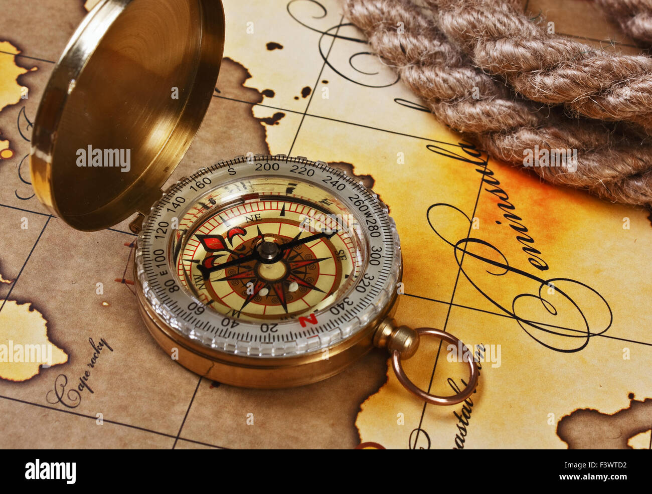 compass and rope on map Stock Photo - Alamy