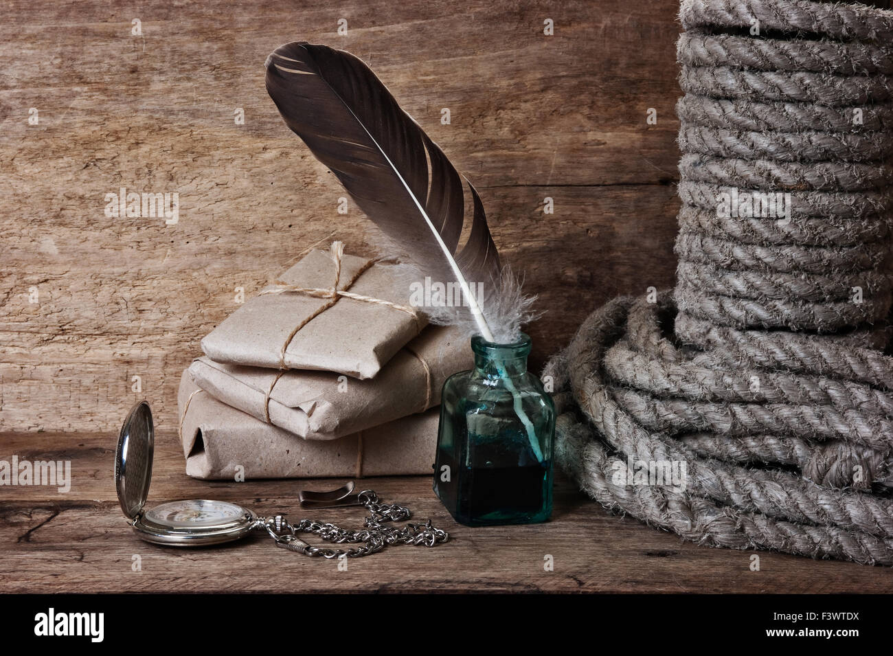 letter and a quill in the inkwell Stock Photo - Alamy