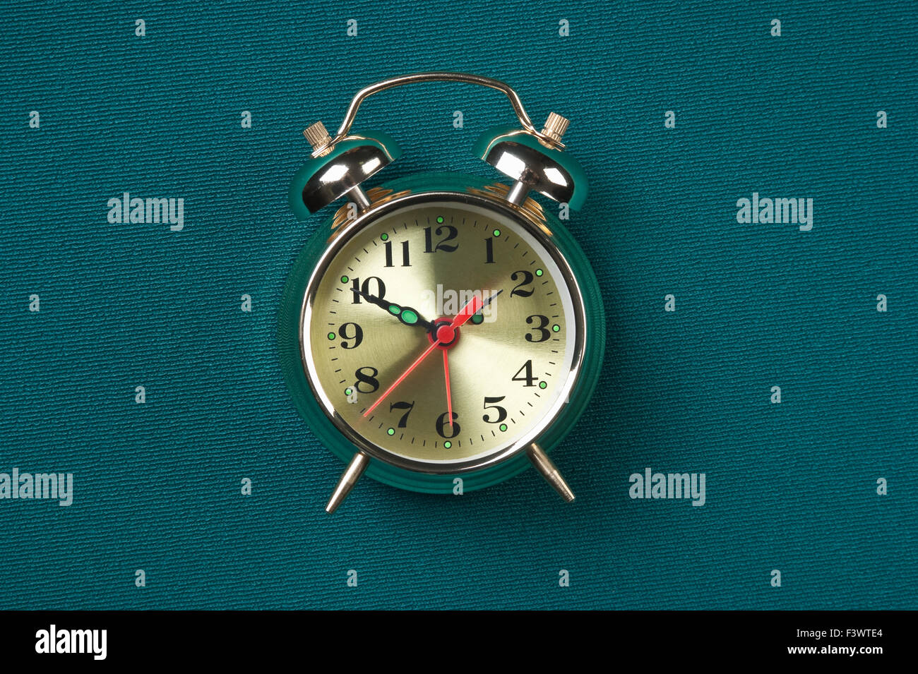 Golden alarm clock hi-res stock photography and images - Alamy