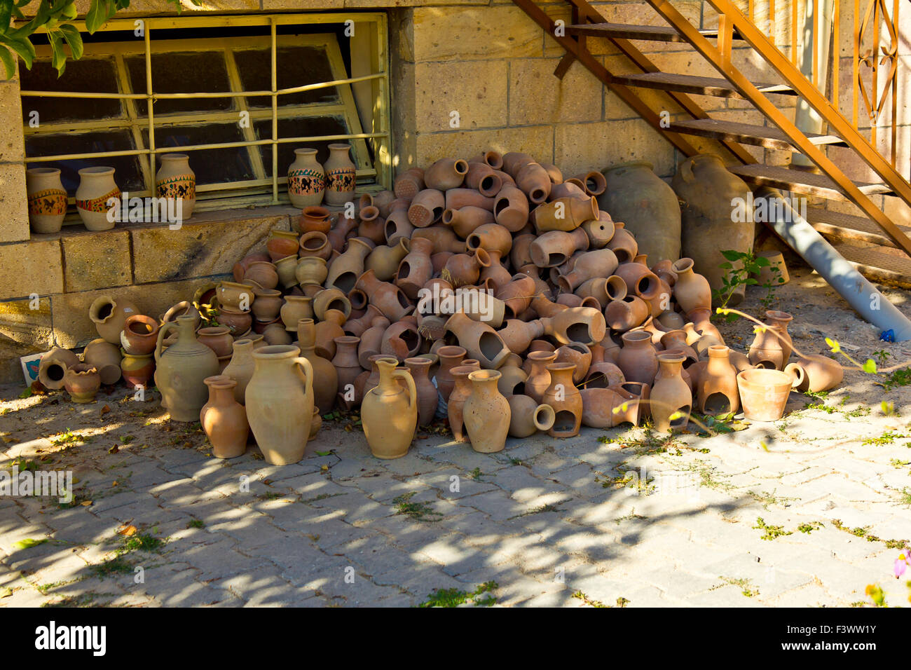 Pile of clay bowls Stock Photo - Alamy
