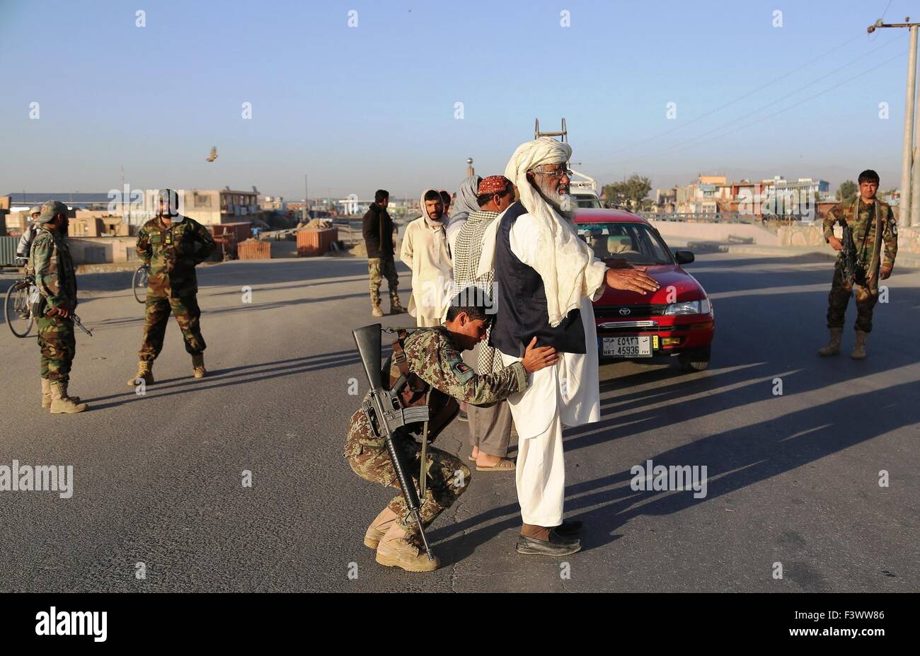 Ghazni, Ghazni province. 13th Oct, 2015. An Afghan solider searches ...