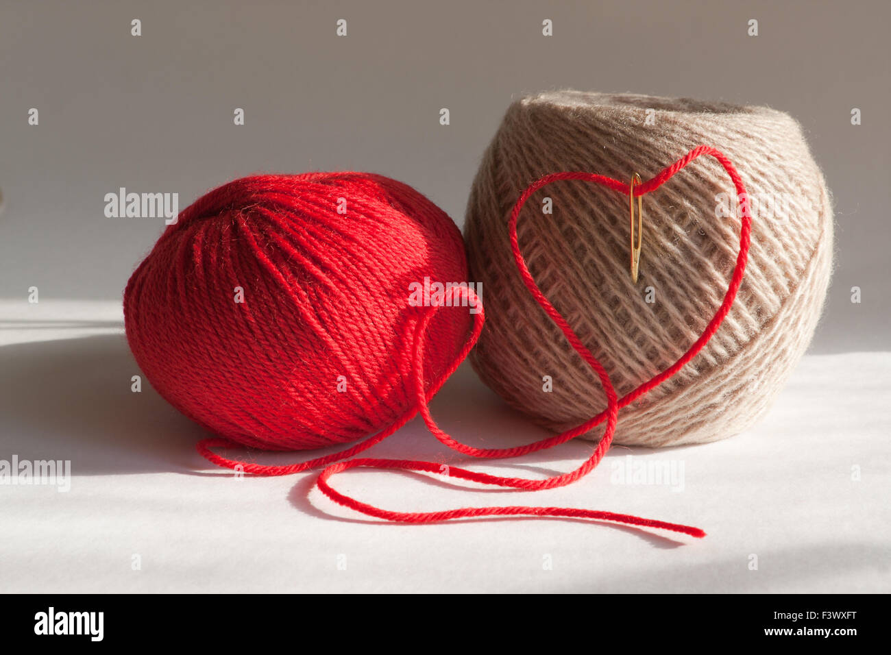 A couple of balls of yarn Stock Photo - Alamy