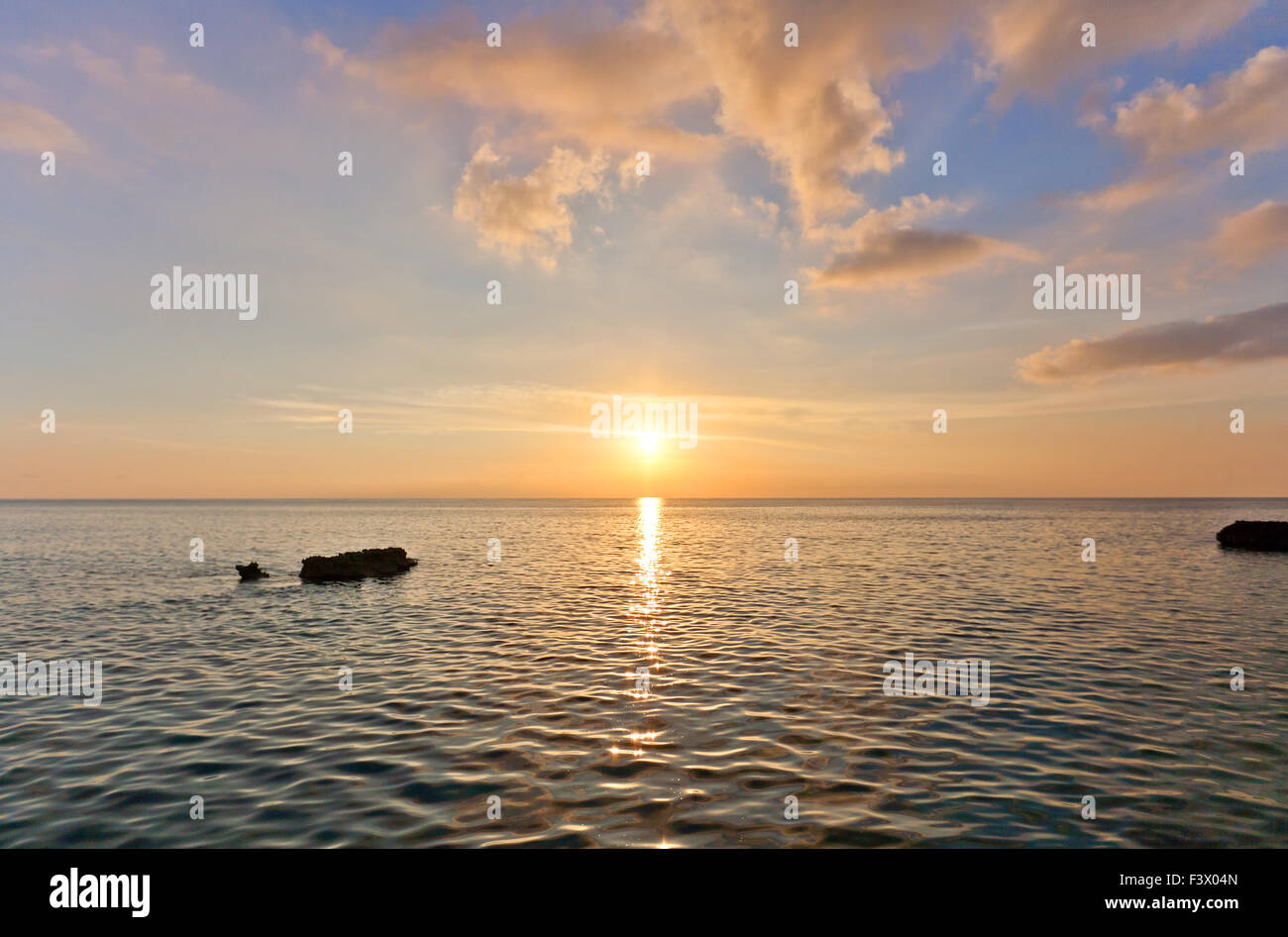 Sunset on the Caribbean seashore of Grand Cayman Island, Cayman Islands ...