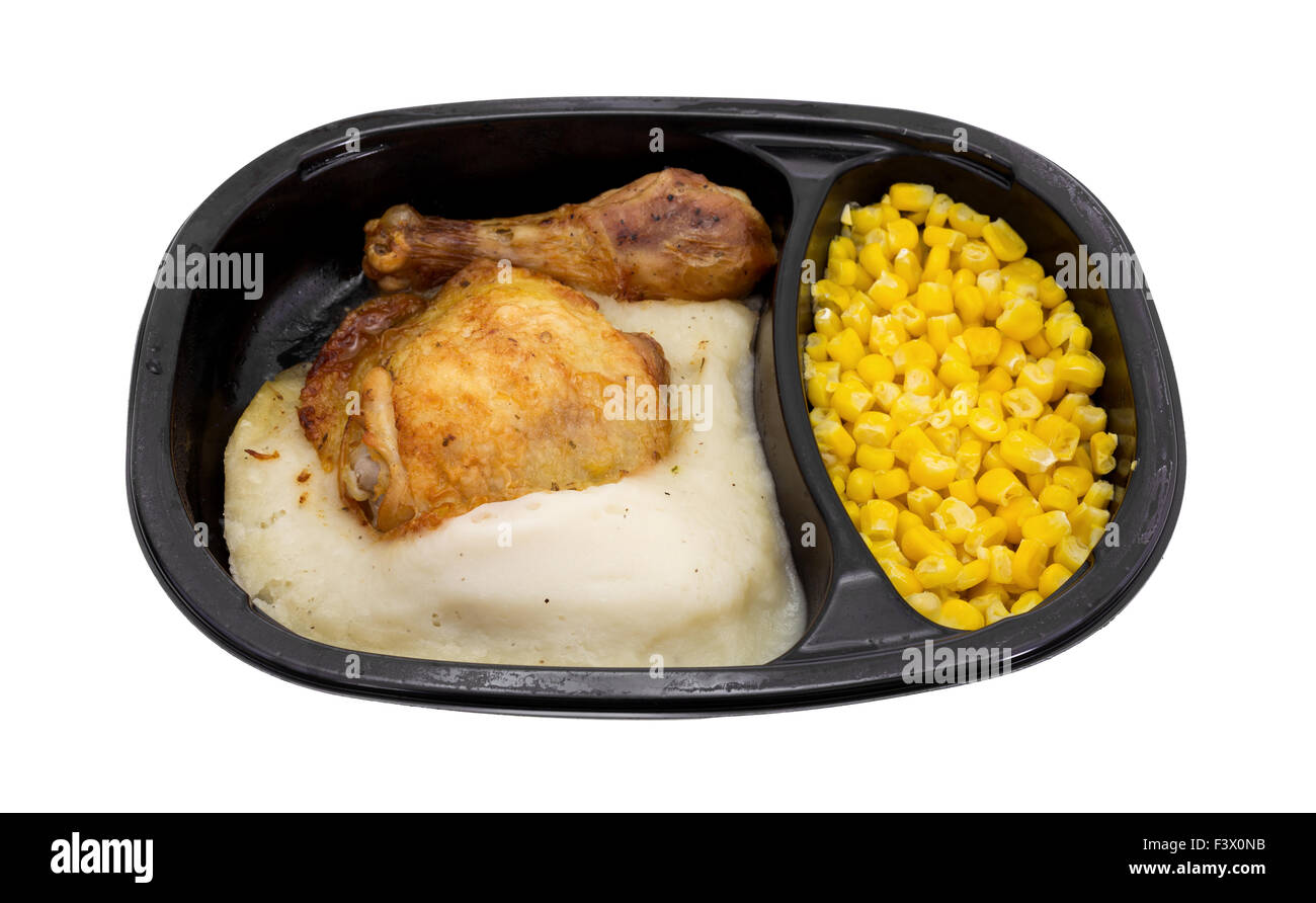A microwaved TV dinner of roasted chicken with mashed potatoes and corn ...