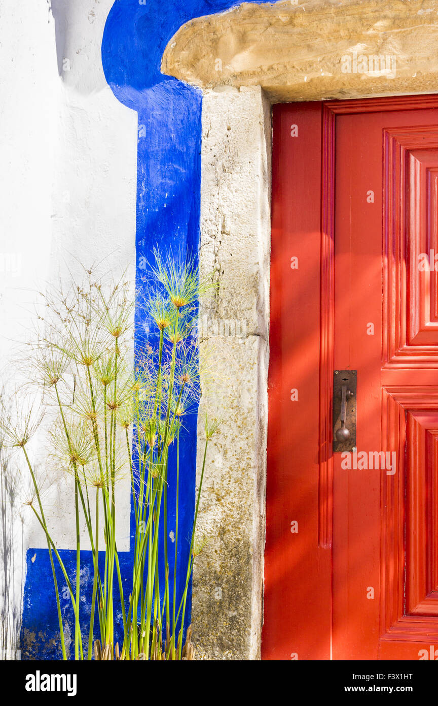 red door, blue frame Stock Photo - Alamy