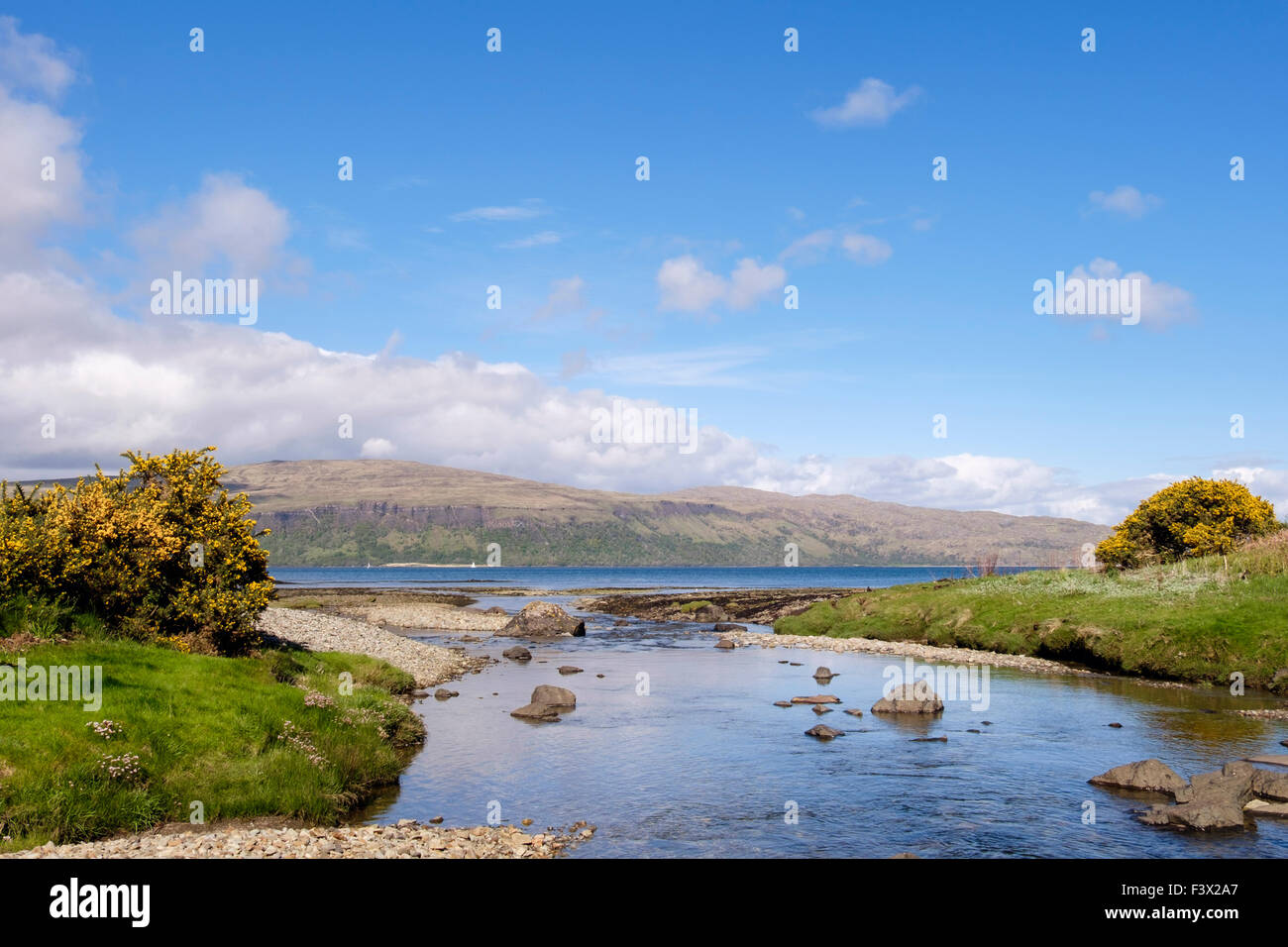 View along small river to Morvern peninsula across Sound of Mull ...