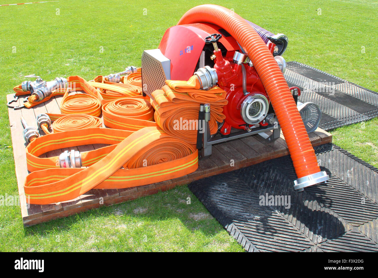 fire brigade, hoses and pump Stock Photo - Alamy