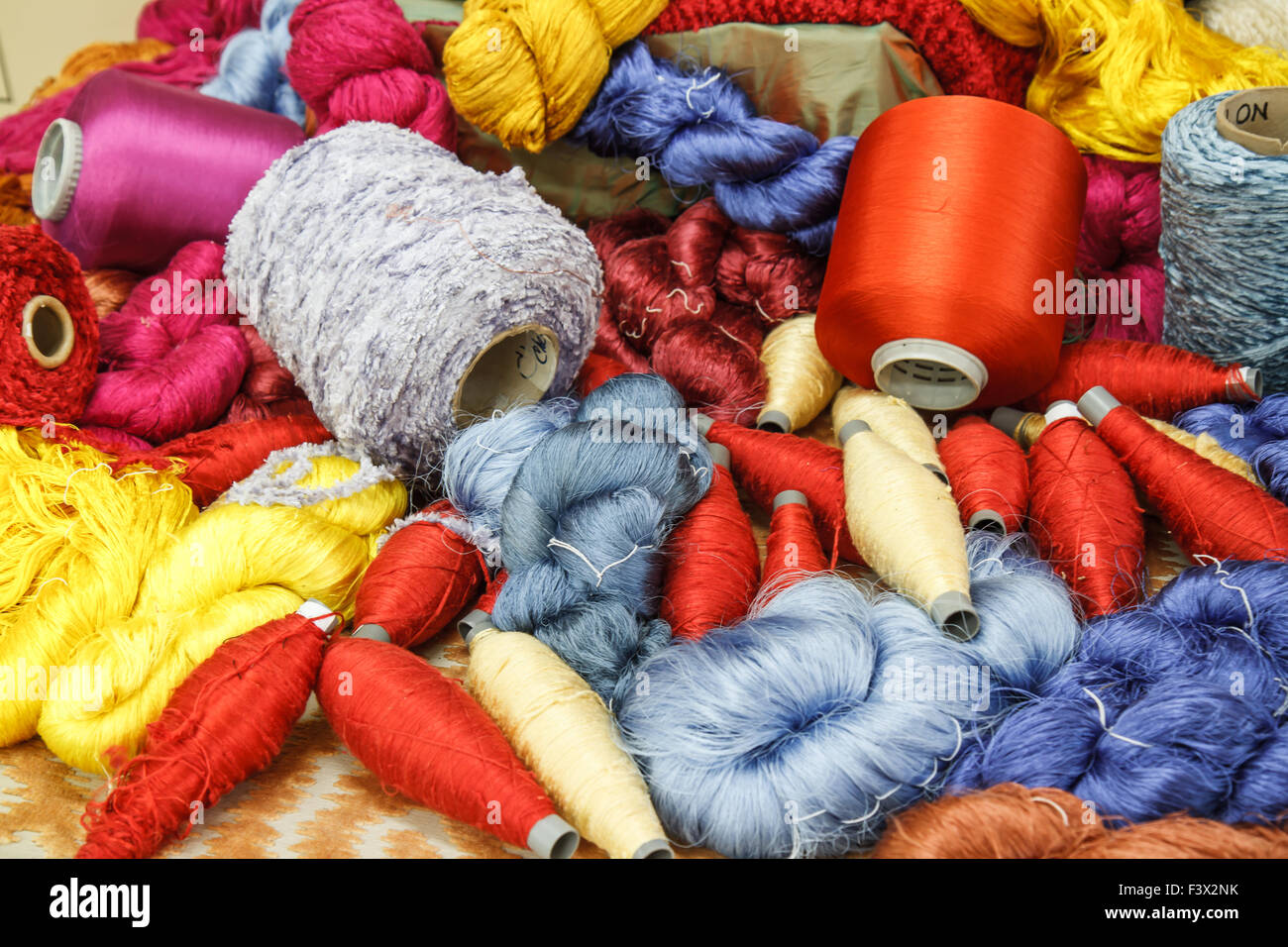 Raw silk thread color for background Stock Photo - Alamy