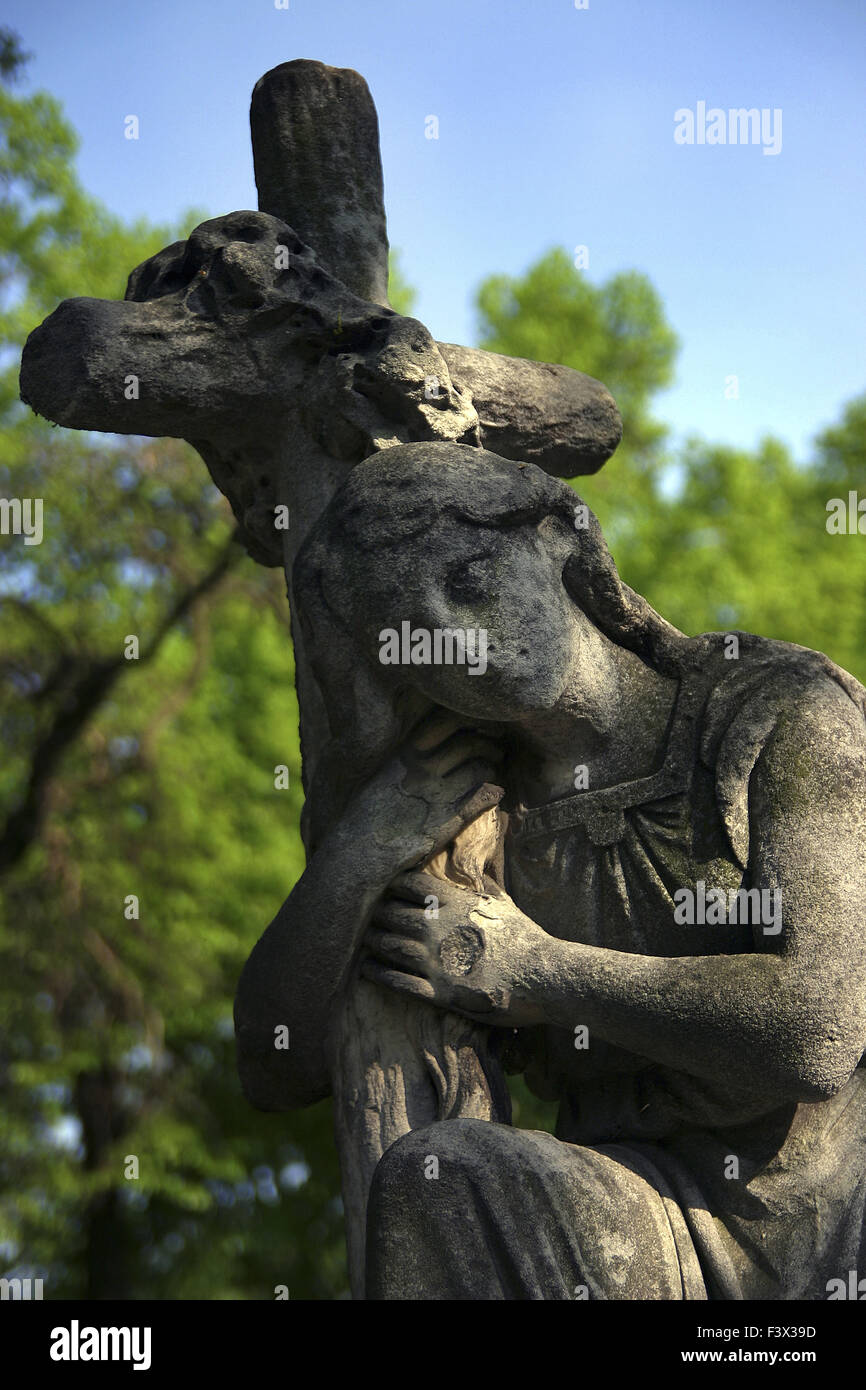 Angels on the cross Stock Photo - Alamy
