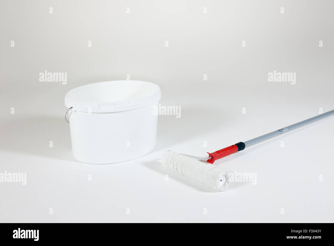 painting with paint roller Stock Photo - Alamy