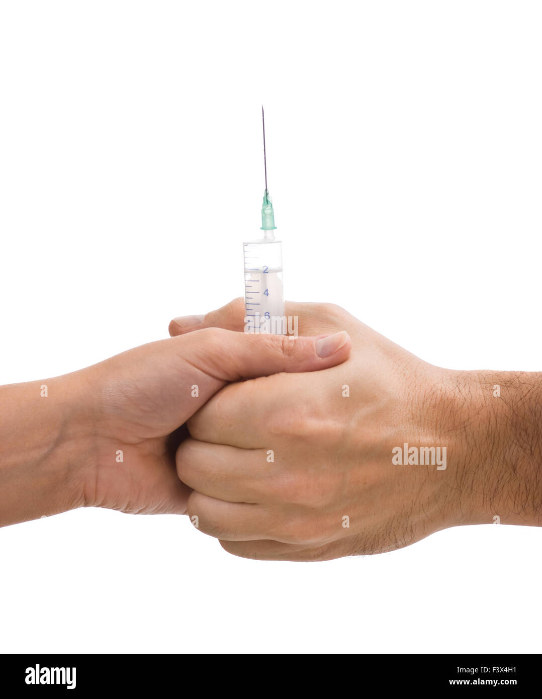 syringe in two hands Stock Photo - Alamy