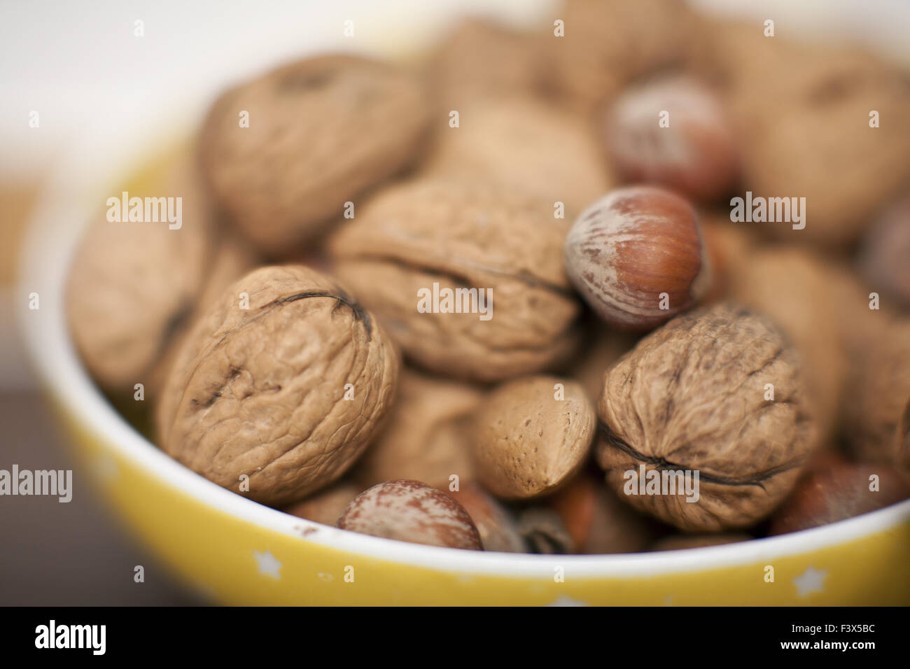 Bowl of nuts Stock Photo - Alamy