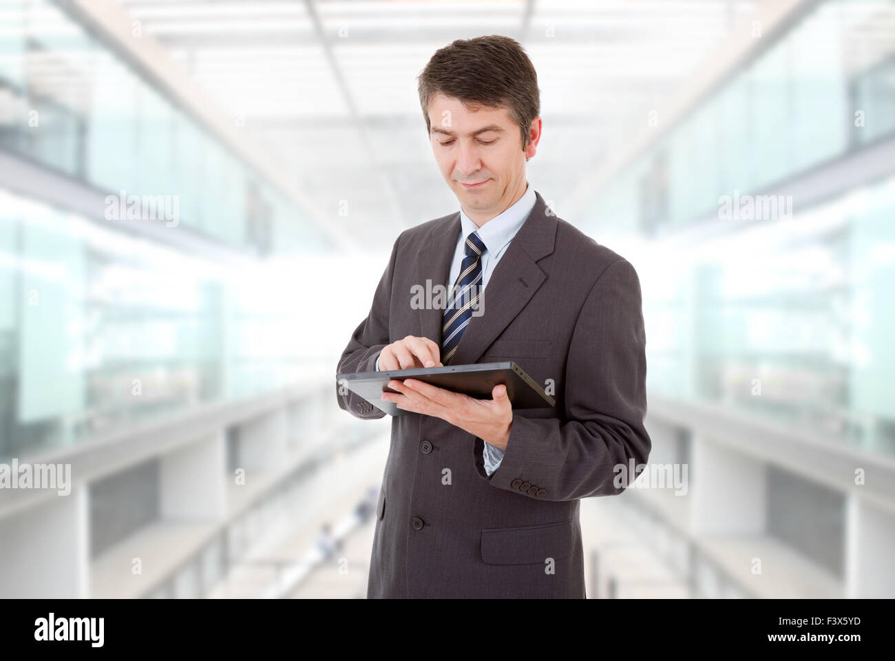 businessman using touch pad of tablet pc, at the office Stock Photo - Alamy