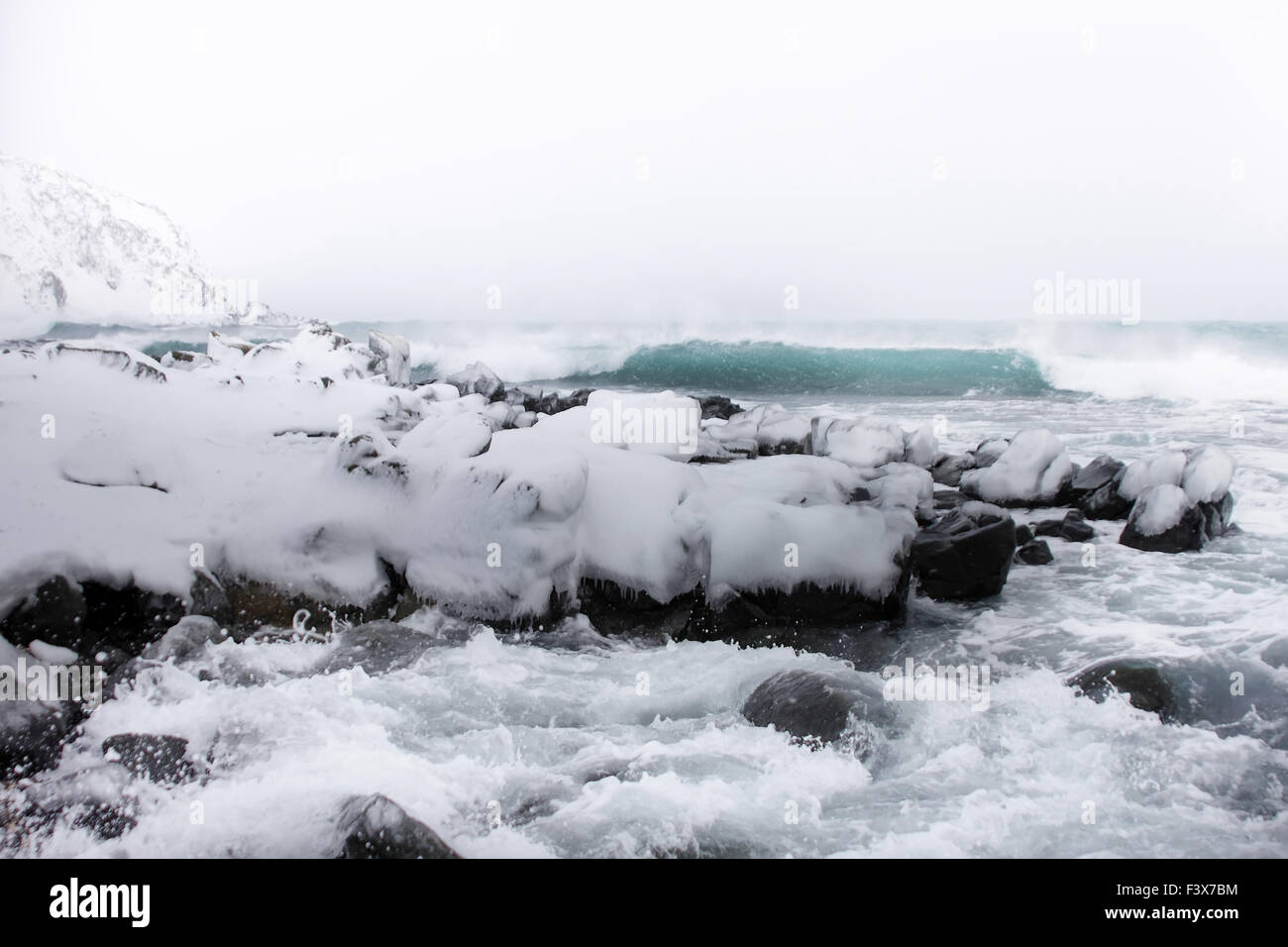 snow and ice around ocean Stock Photo - Alamy