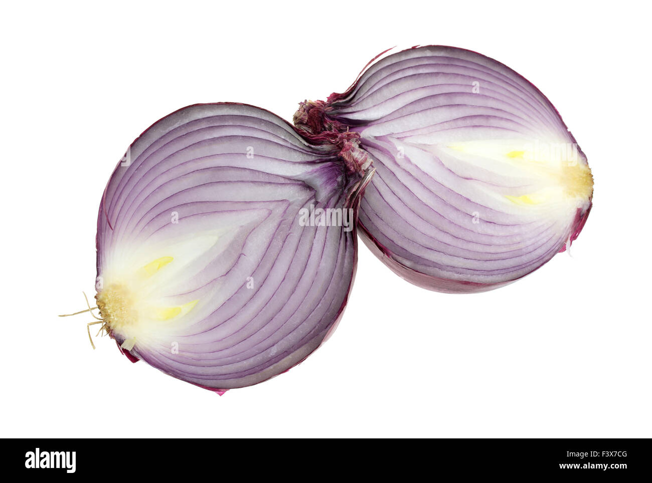 A large red onion that has been sliced in half isolated on a white ...