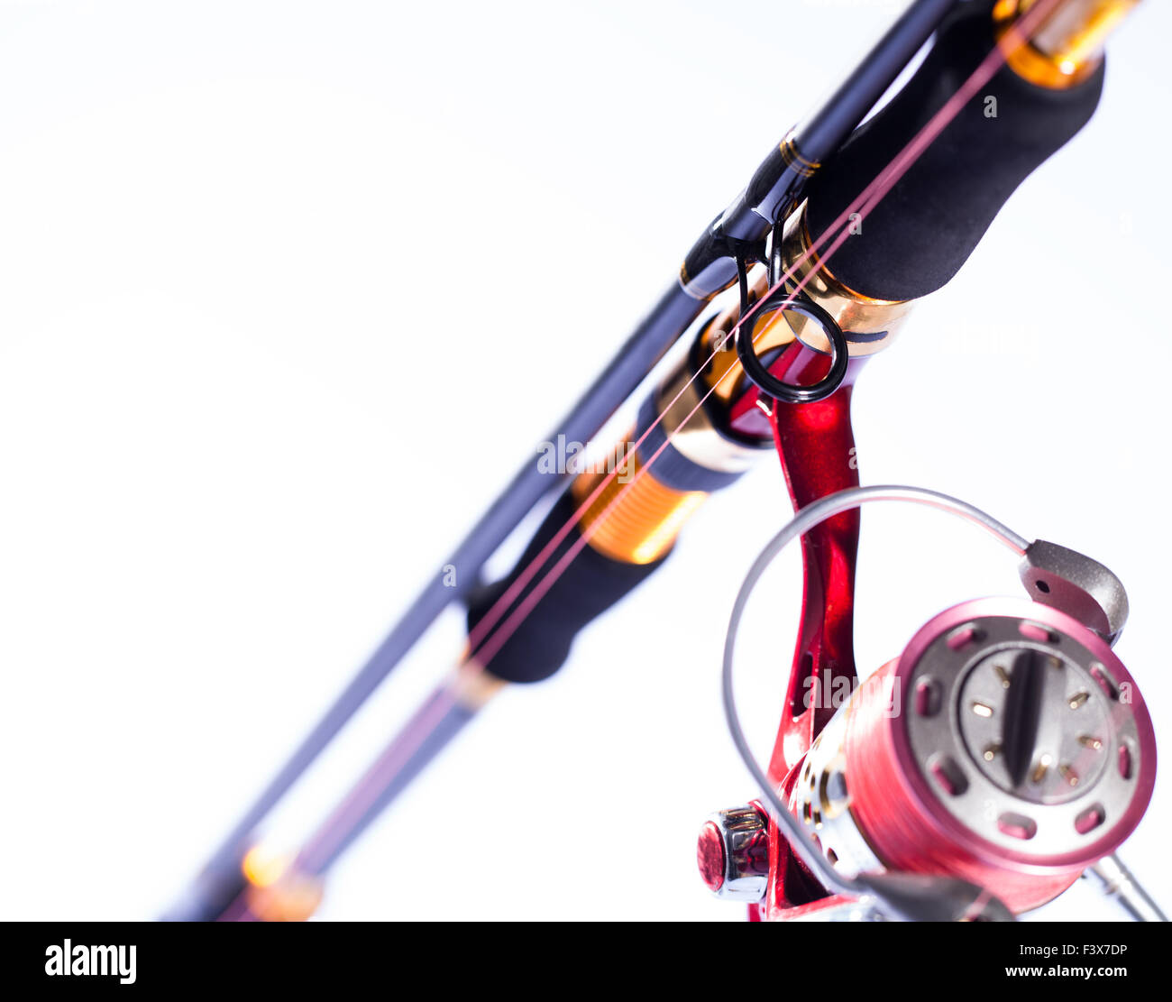 Fishing rod with reel Stock Photo - Alamy