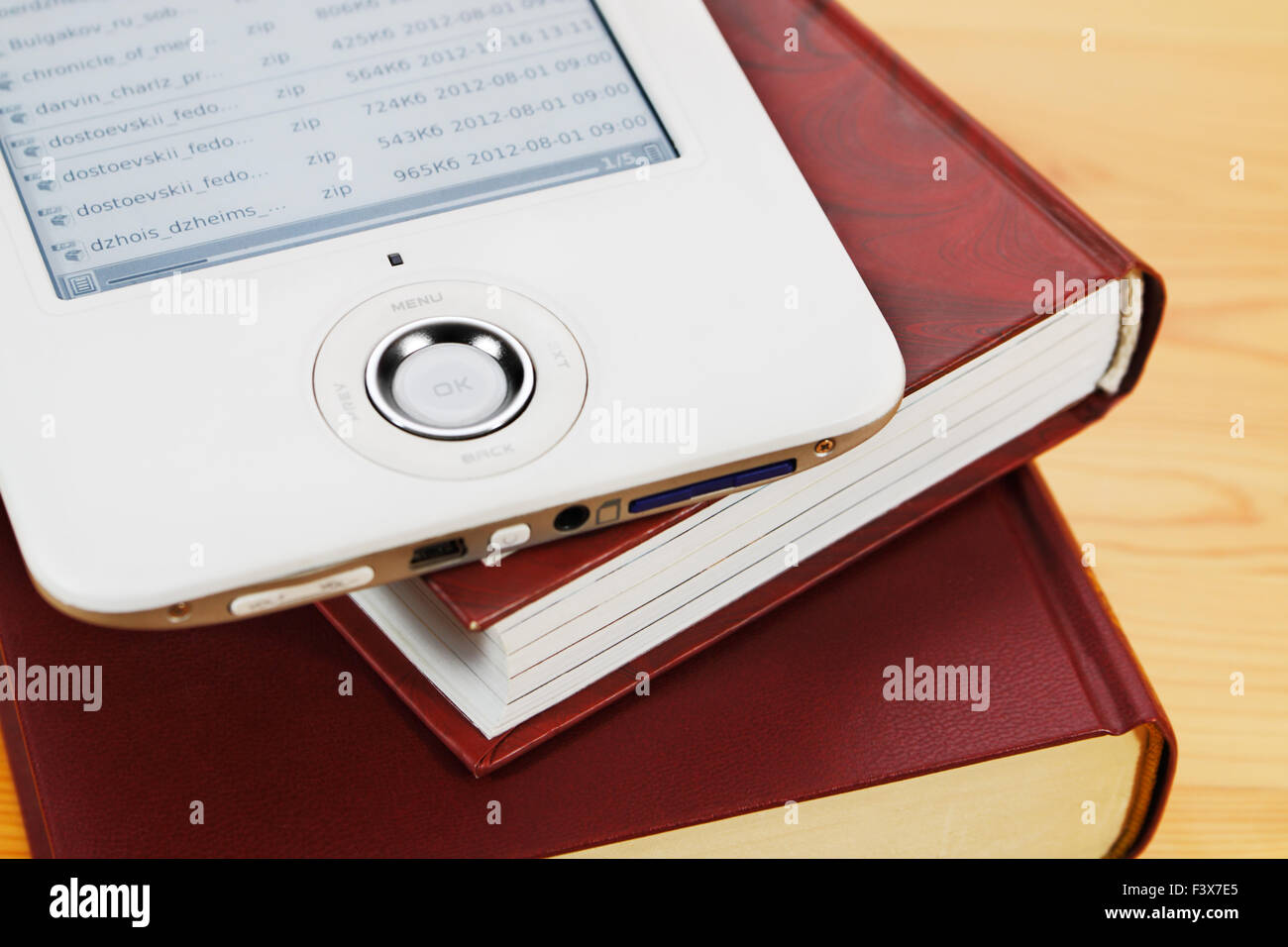 Paper books and e-book Stock Photo - Alamy