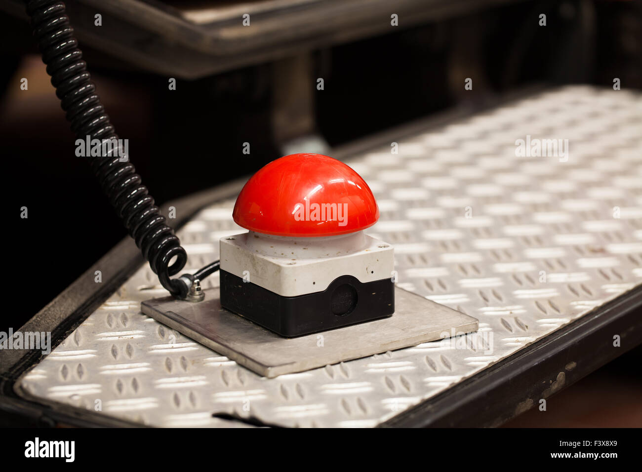 Fire department alarm button Stock Photo - Alamy