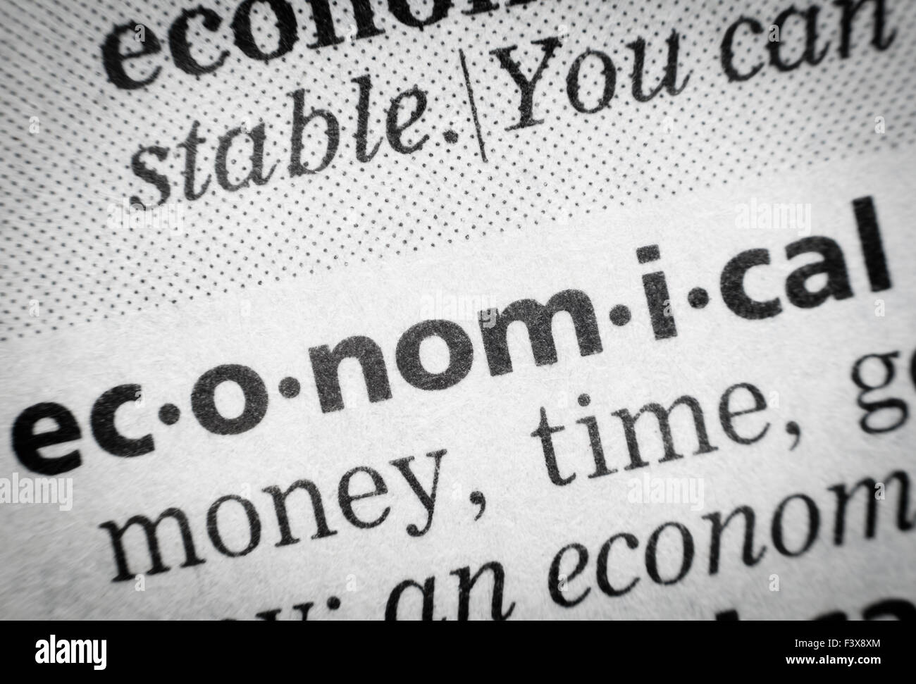 word economical in glossary, macro Stock Photo - Alamy
