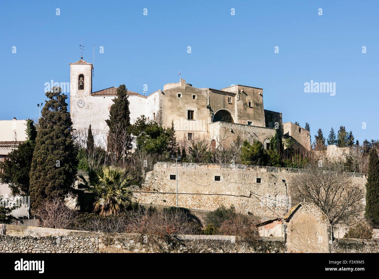 Canyelles, church and castle Stock Photo - Alamy