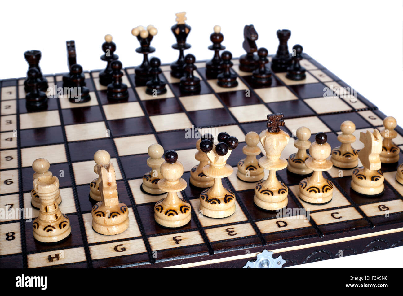 Chess board with figures during chess play Stock Photo - Alamy