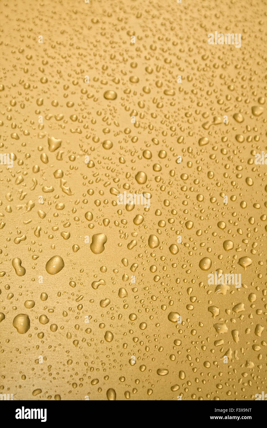 Gold drops of water Stock Photo - Alamy