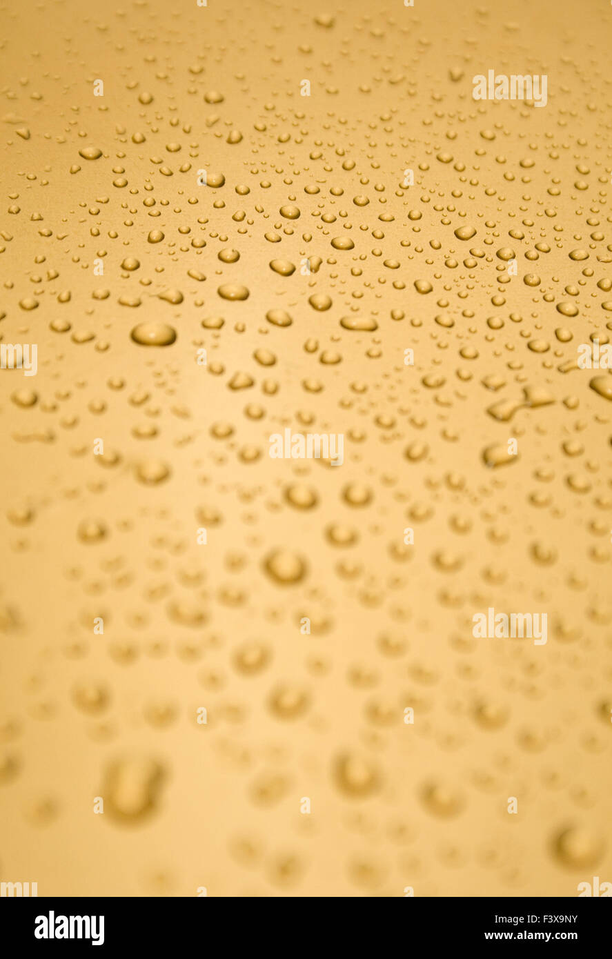 Abstract orange drops of water background Stock Photo - Alamy