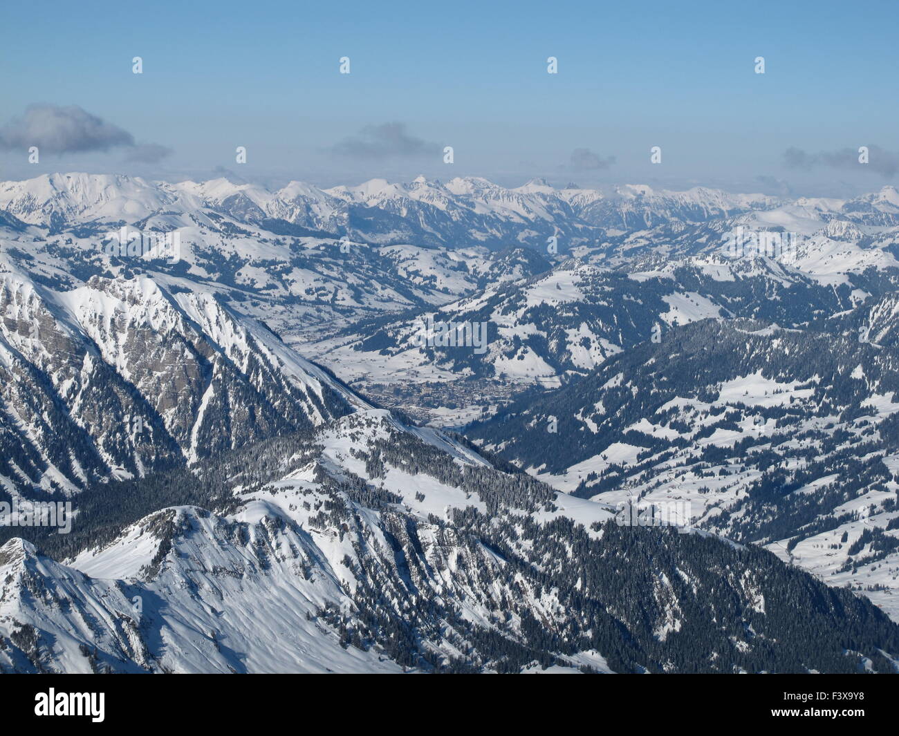 Gstaad and mountains Stock Photo - Alamy