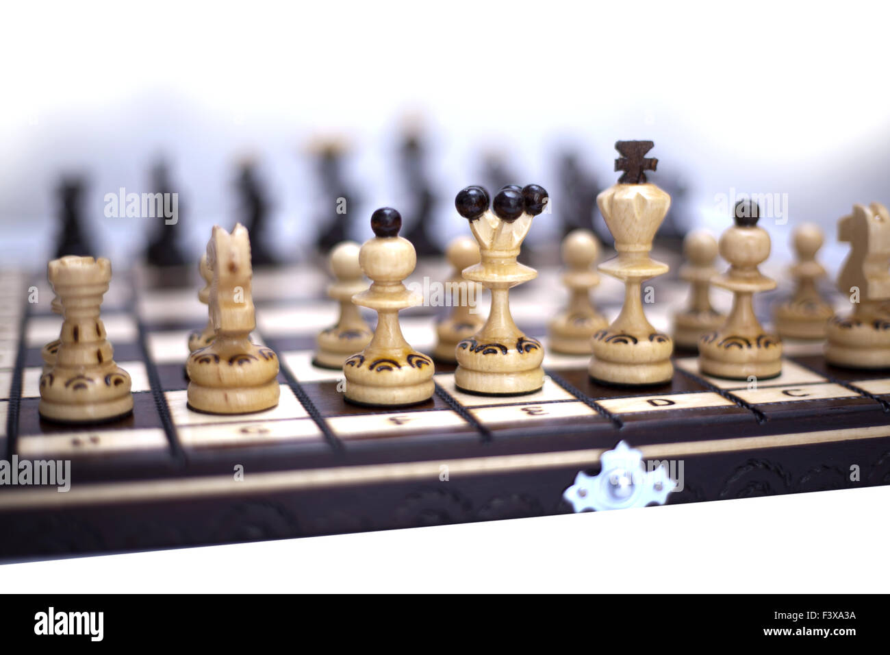 Chess board with figures during chess play Stock Photo - Alamy