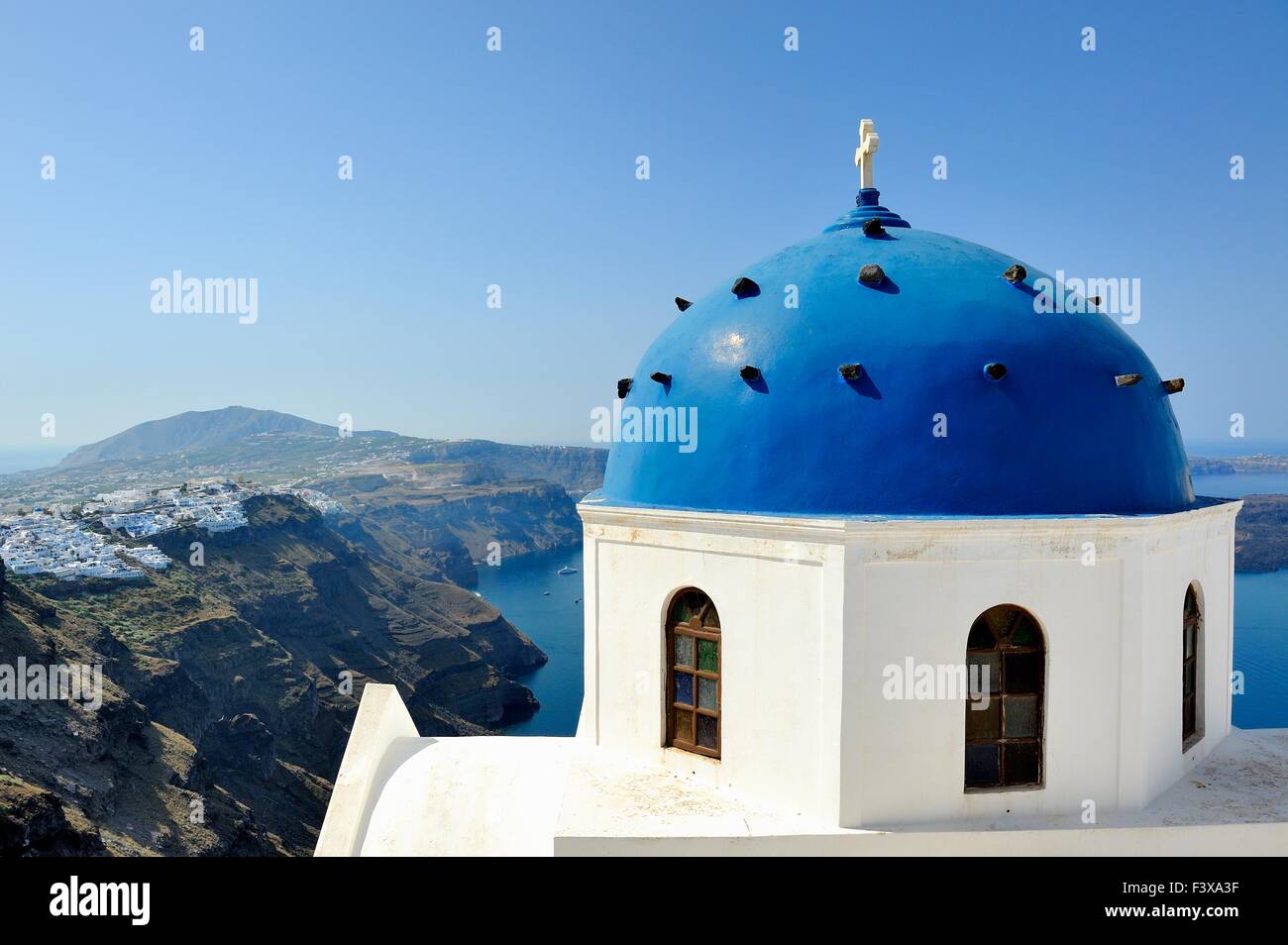 A typical iconic blue domed church on the island of Santorini Greece ...