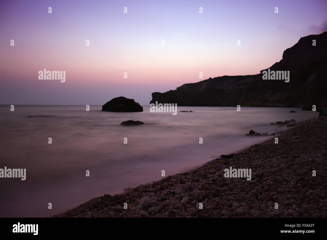 Beautiful beach landscape yellow sandy and rocky beach with hi-res ...