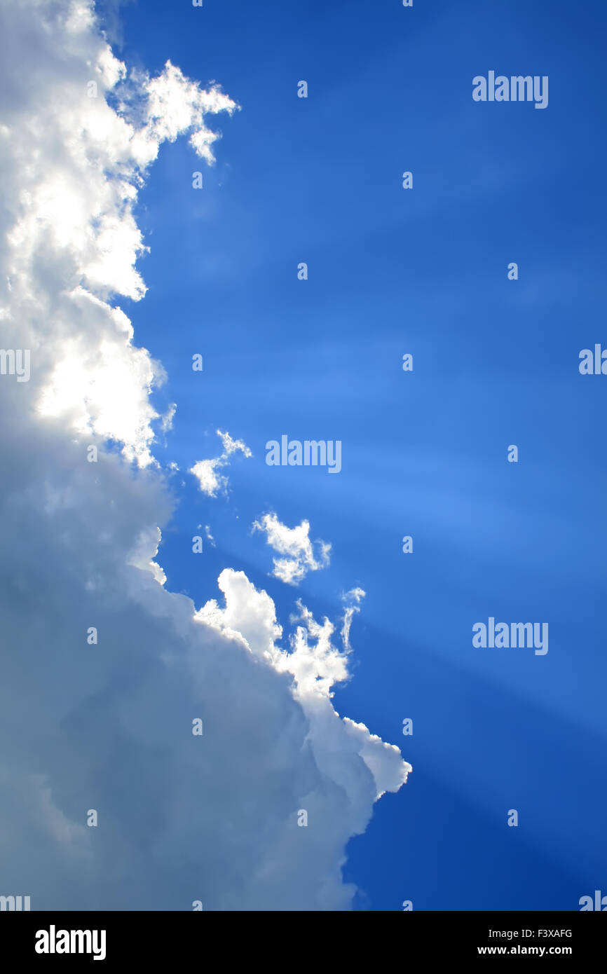 Sunny clouds with rays of light Stock Photo - Alamy