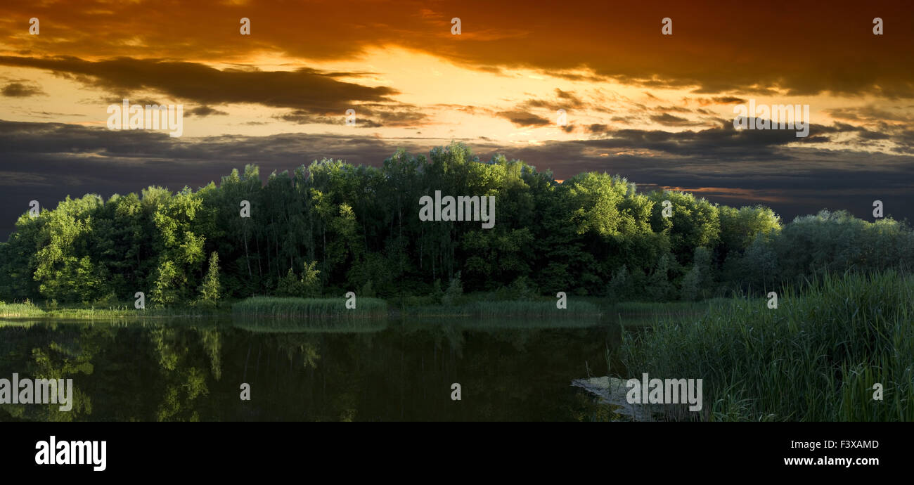 Cool dramatic sunset lake Stock Photo - Alamy