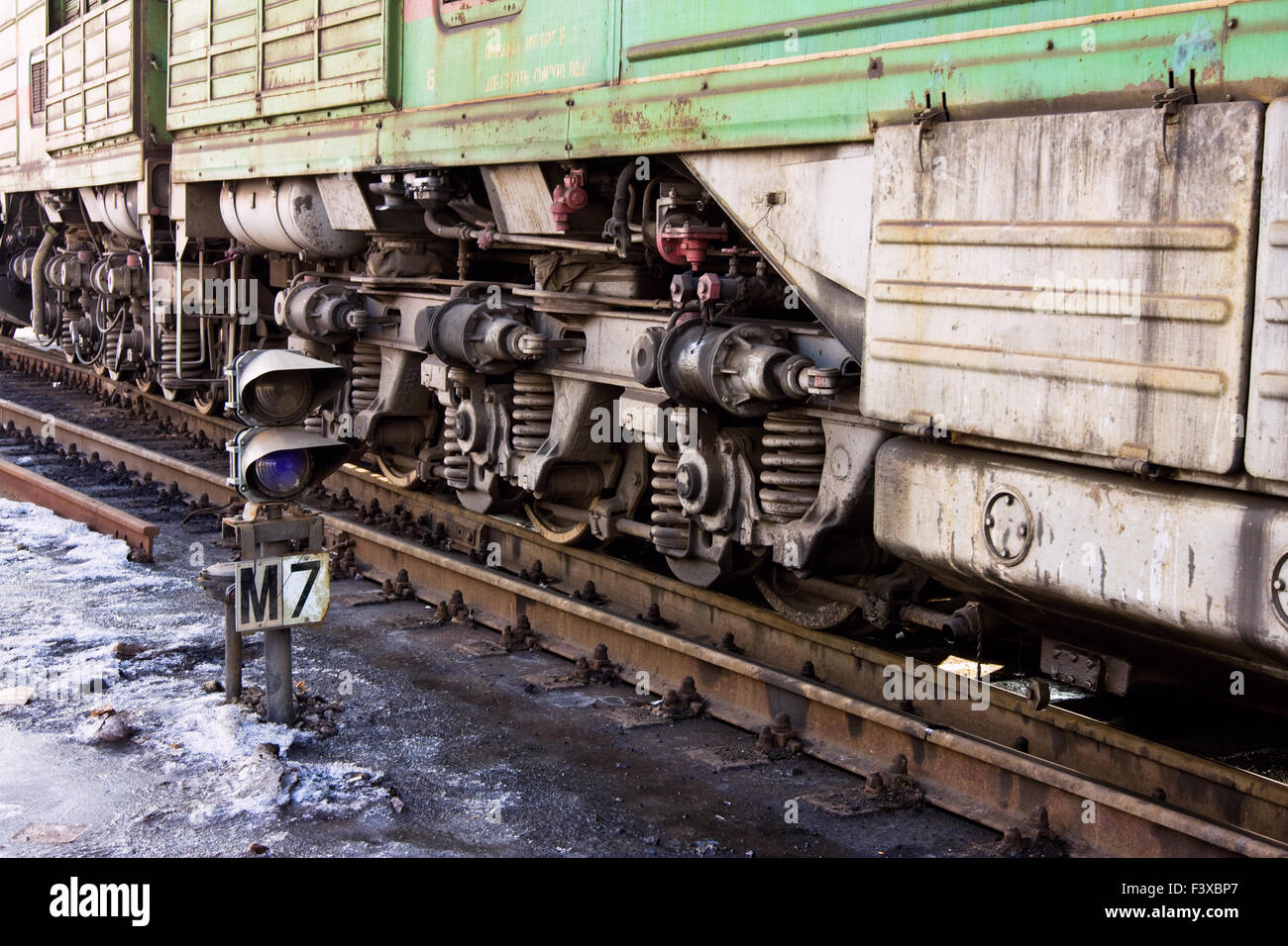 Train approaches on rails Stock Photo - Alamy