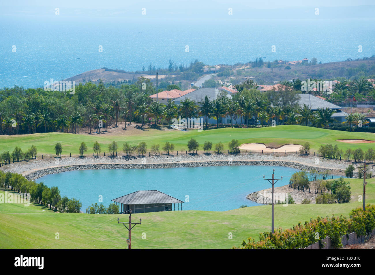park with pond by ocean Stock Photo - Alamy