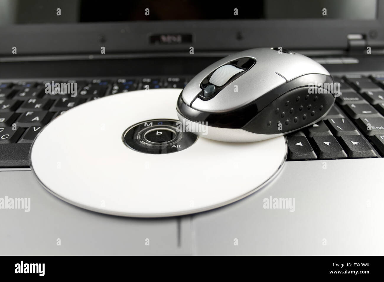 Silver laptop cd dvd hi-res stock photography and images - Alamy
