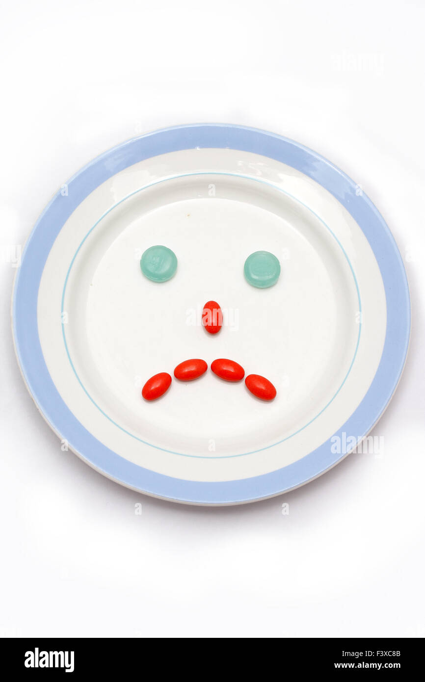 sad pills face Stock Photo - Alamy