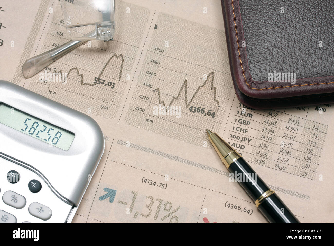 Pen and wallet Stock Photo - Alamy