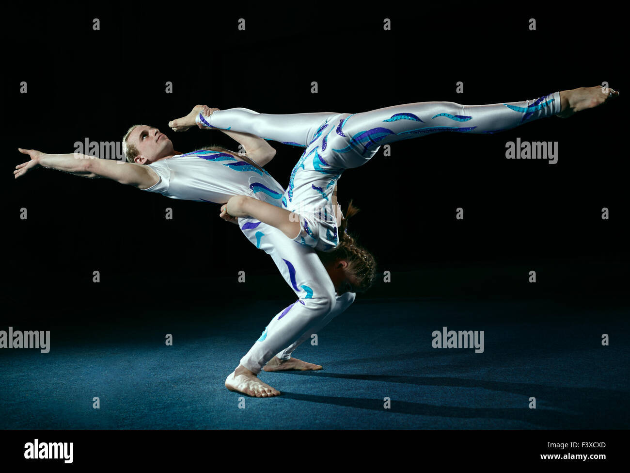 Circus artists perform different tricks Stock Photo - Alamy