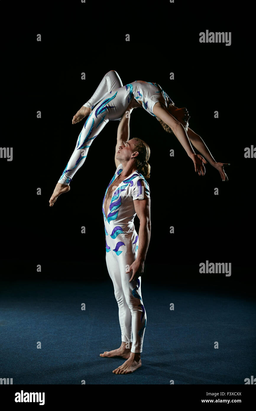 Circus artists perform different tricks Stock Photo - Alamy