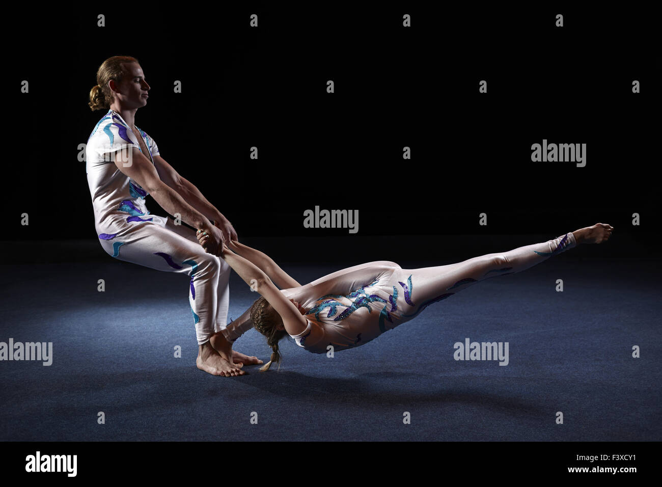 Circus artists perform different tricks Stock Photo - Alamy