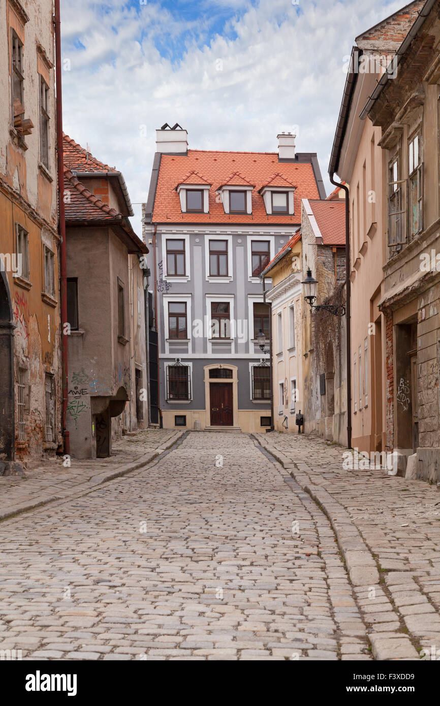 Vintage city street with paving stone Stock Photo - Alamy