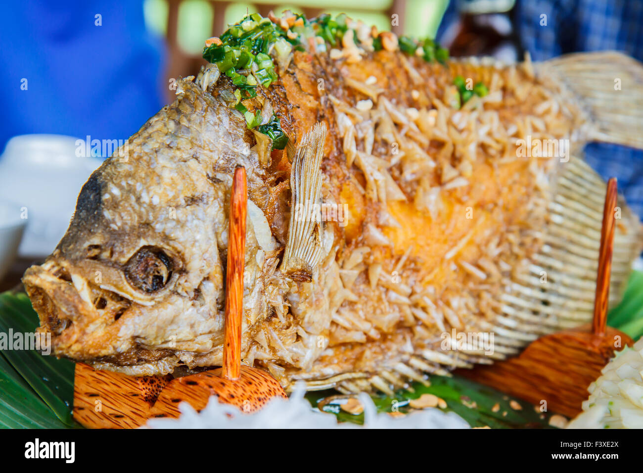 Fried fish prepared in the traditional Vietnamese Stock Photo - Alamy
