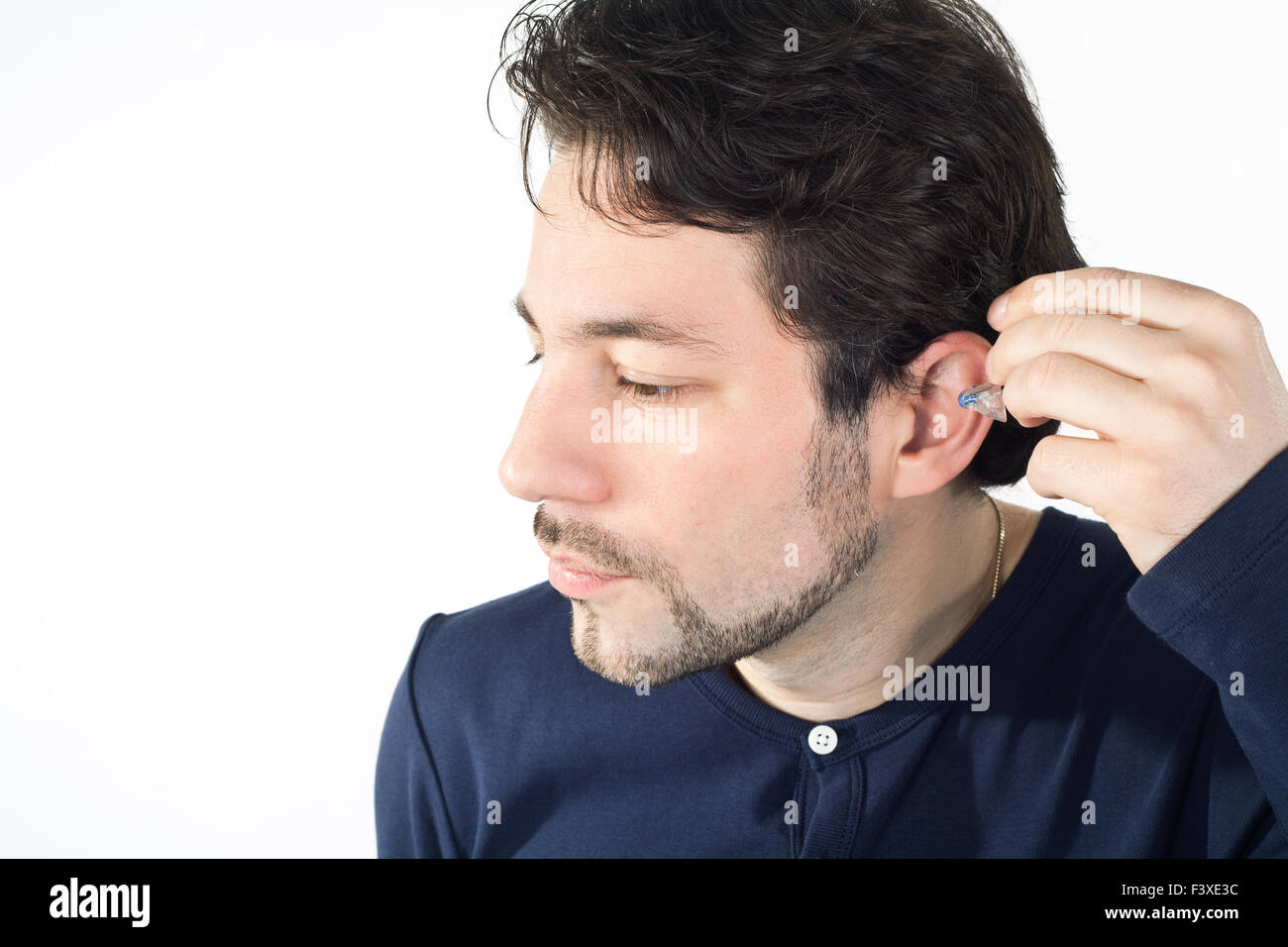 ear with acoustic instrument Stock Photo - Alamy